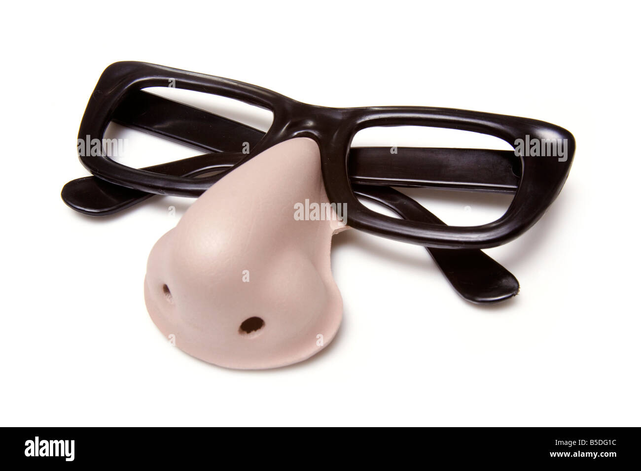Funny disguise glasses and nose isolated on a white studio background ...