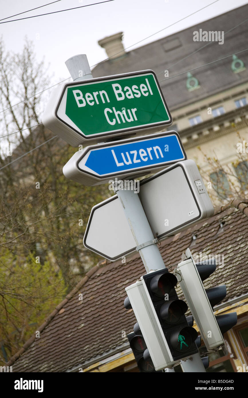 Swiss street sign direction to Bern Basel and Luzern Stock Photo - Alamy