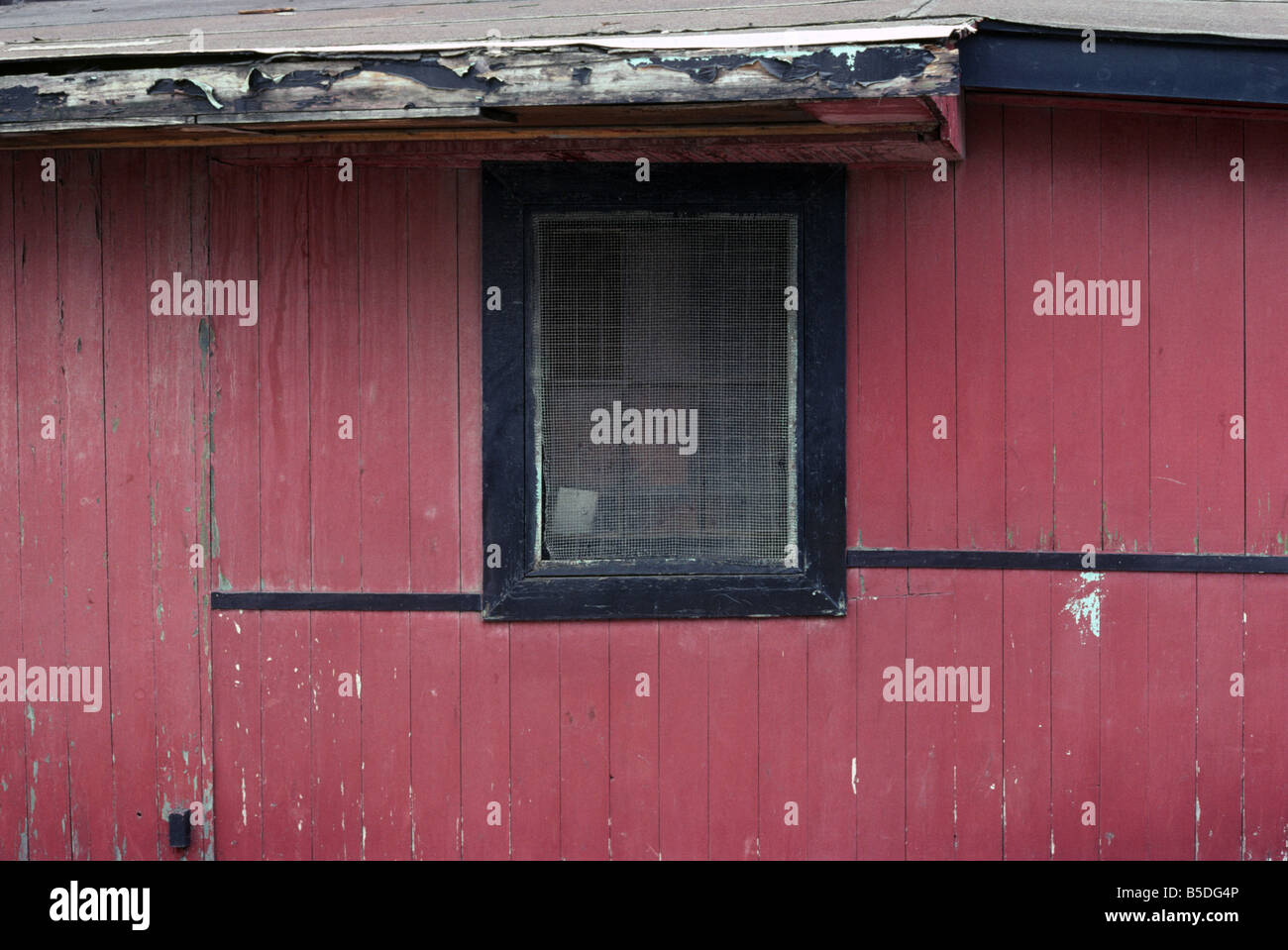 One old window and red wall Stock Photo - Alamy
