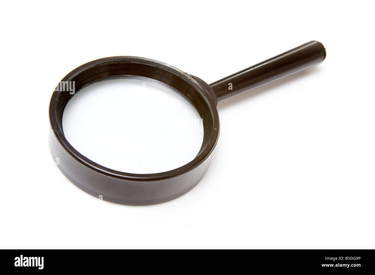 Magnifying glass isolated on a white studio background Stock Photo - Alamy