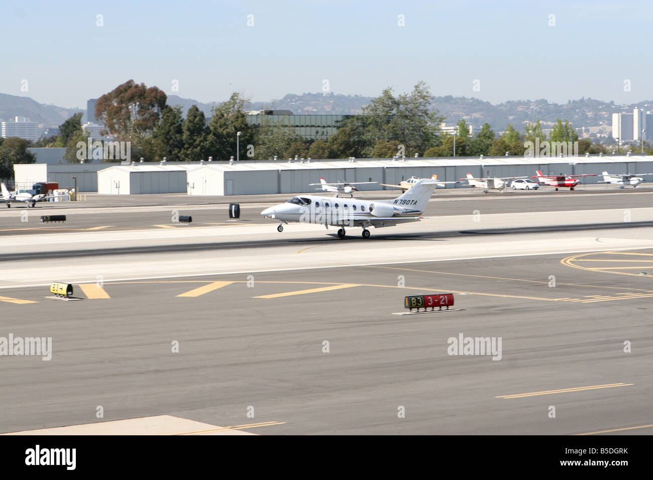 Airplane on runway Stock Photo - Alamy