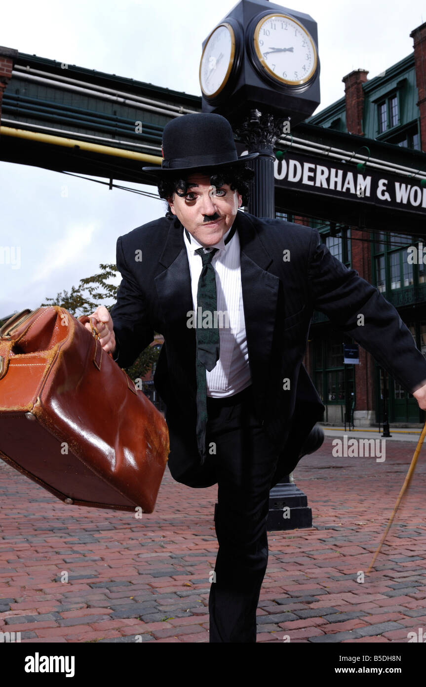 Businessman running to work Stock Photo - Alamy