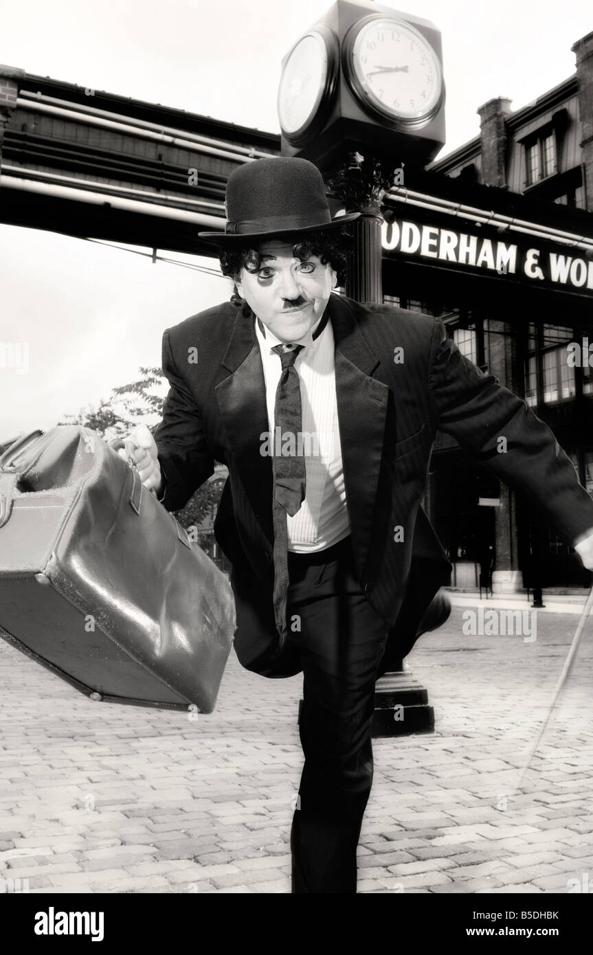 Man white suit running hi-res stock photography and images - Alamy