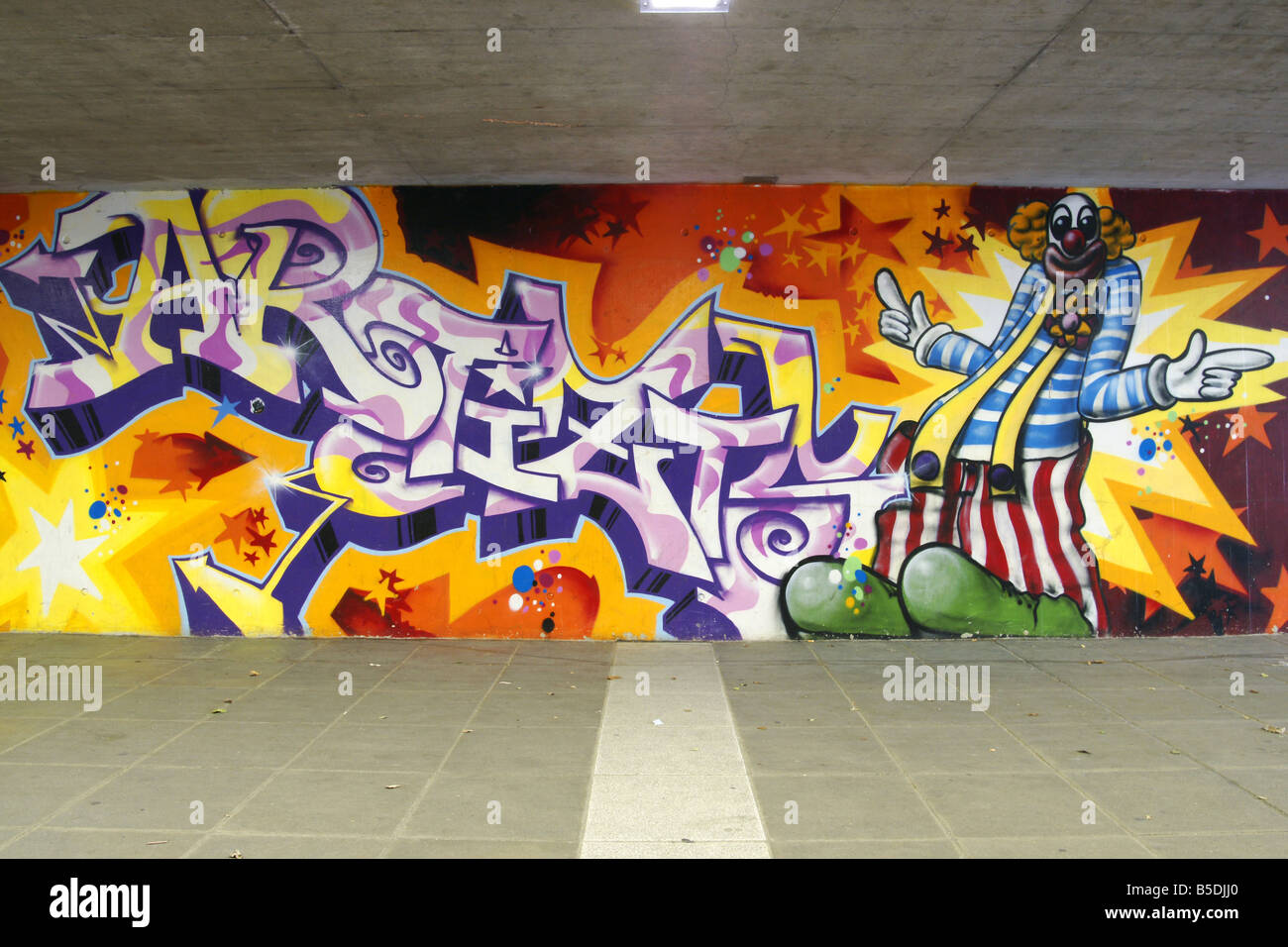 Graffiti: clown and writing "artizt Stock Photo - Alamy