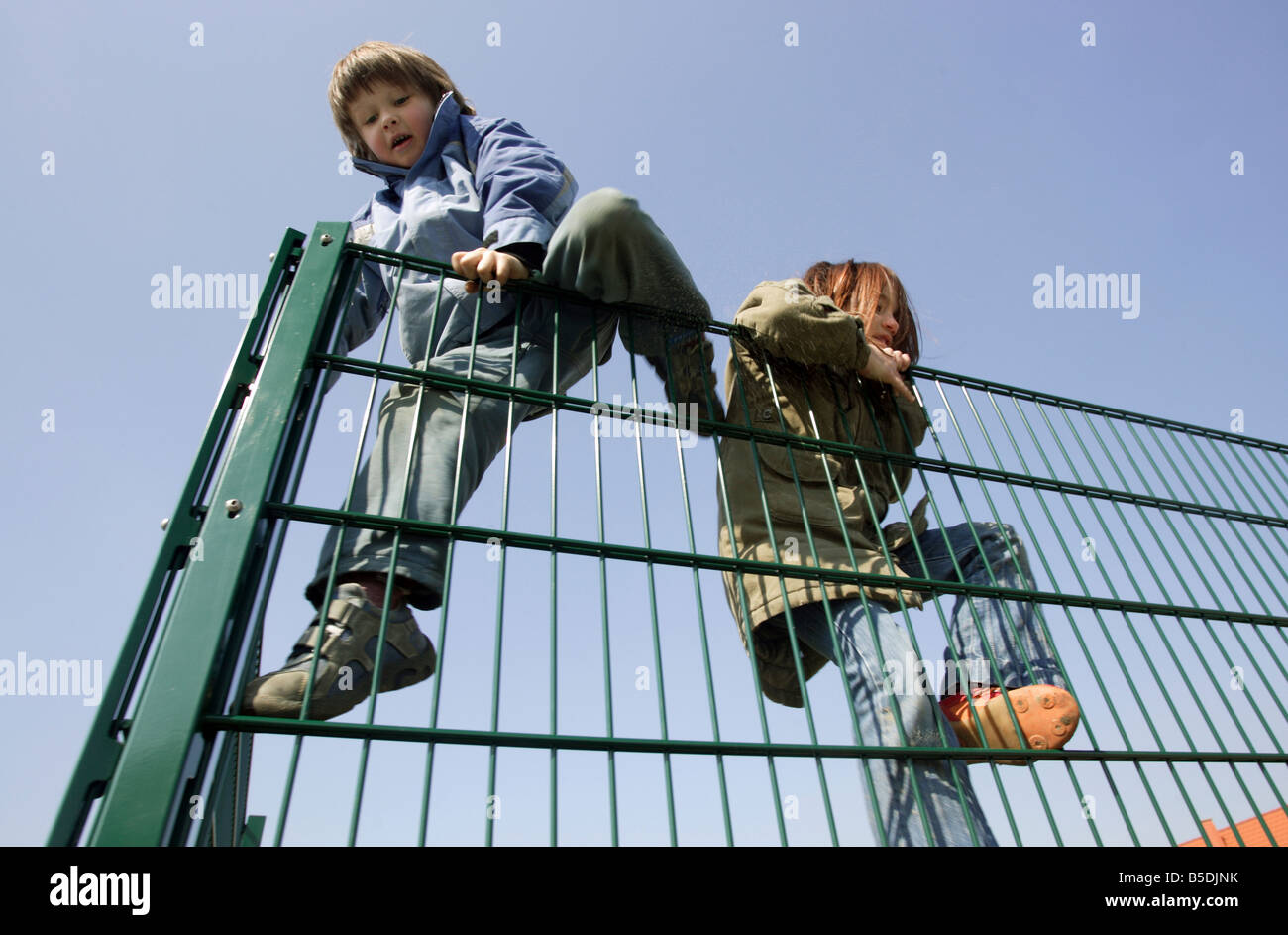 Climbing A Fence High Resolution Stock Photography and Images - Alamy