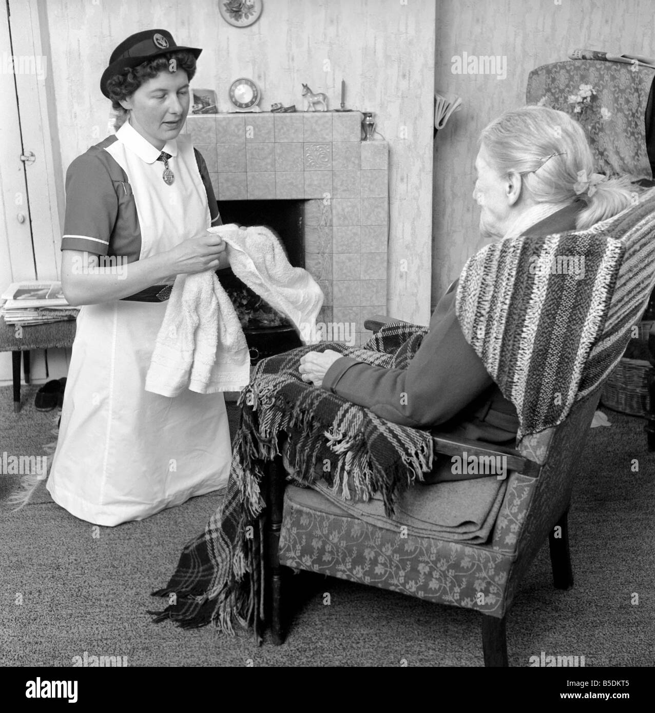 The District Nurse: General scenes of District Nurse Muggeride out on ...