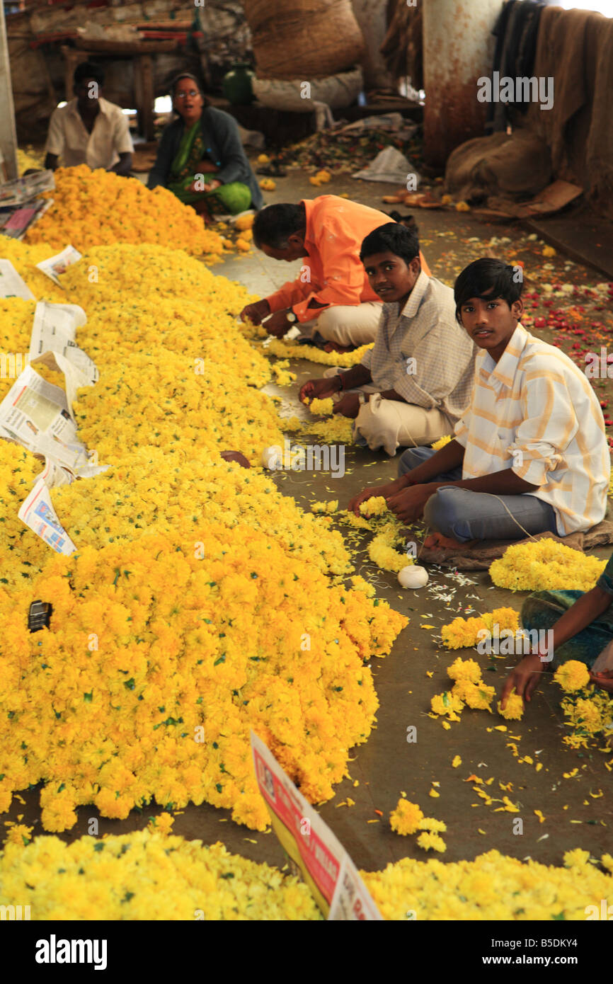Boy selling flowers in a flower market, Bangalore India Stock Photo - Alamy
