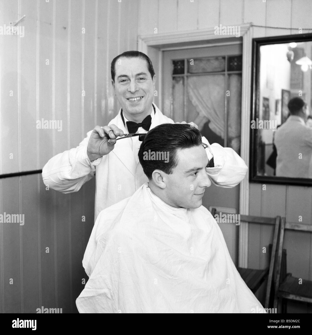 Mens Barbers Shop: Mr. Thomas the barber seen here having a joke with ...