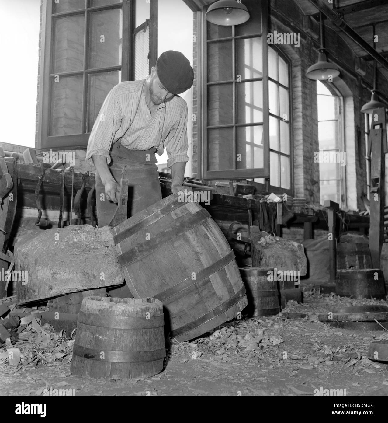Coopers making beer barrels at the Whitbread brewery. October 1958 ...