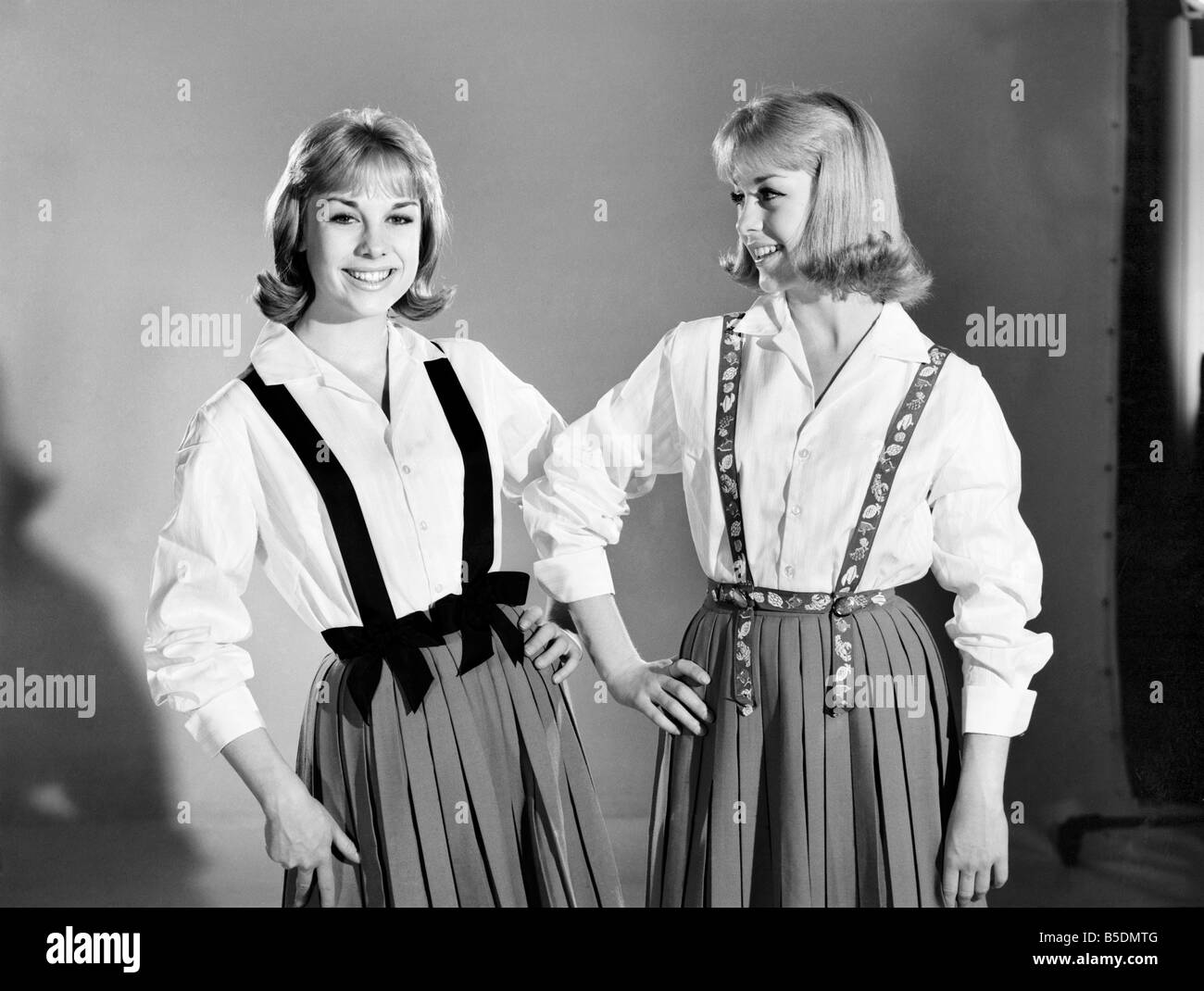 Models: Baker Twins wearing braces. July 1962 Stock Photo - Alamy