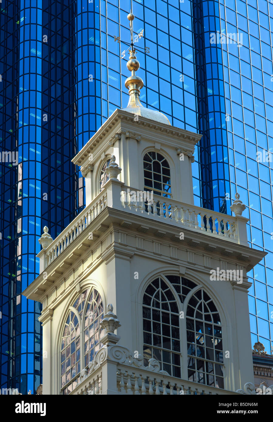 Contrasting church tower and modern office building Boston ...