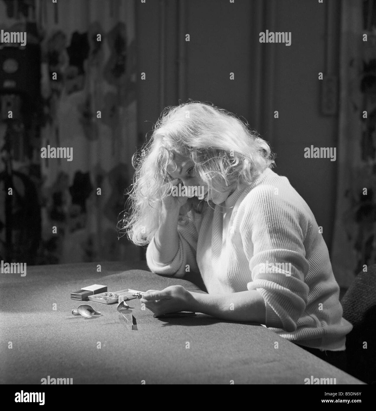 Model shot: Drug addict seen here taking drugs. 1960 A1217-009 Stock ...