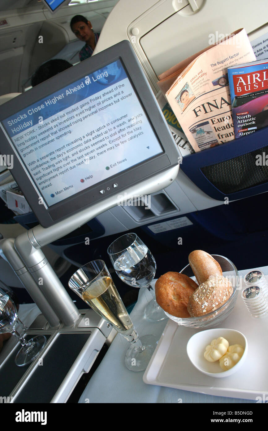 First class cabin dining food Jet Airways plane Stock Photo - Alamy