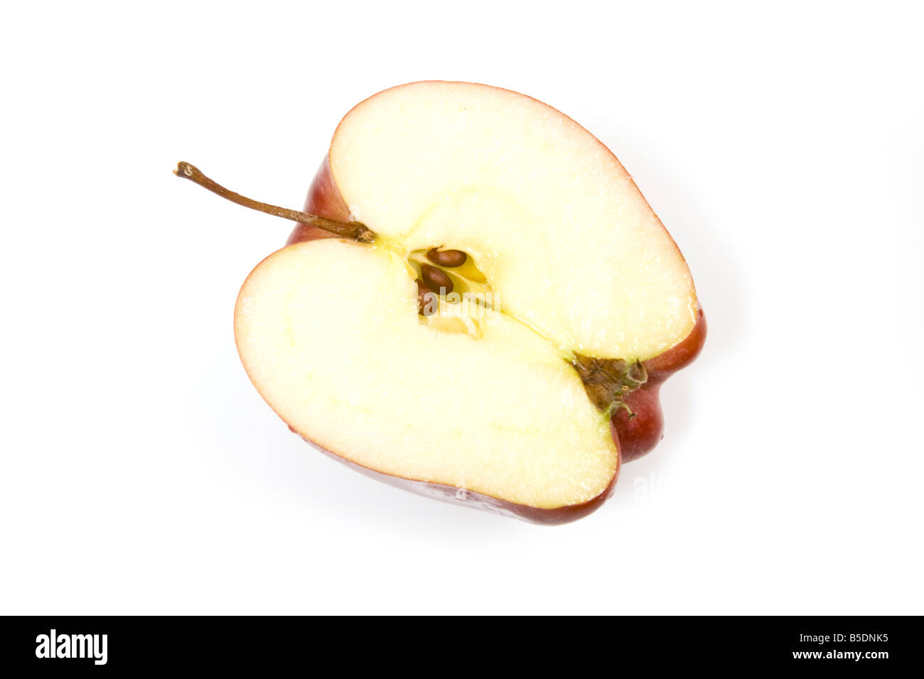 Red apple halved isolated on a white studio background Stock Photo - Alamy