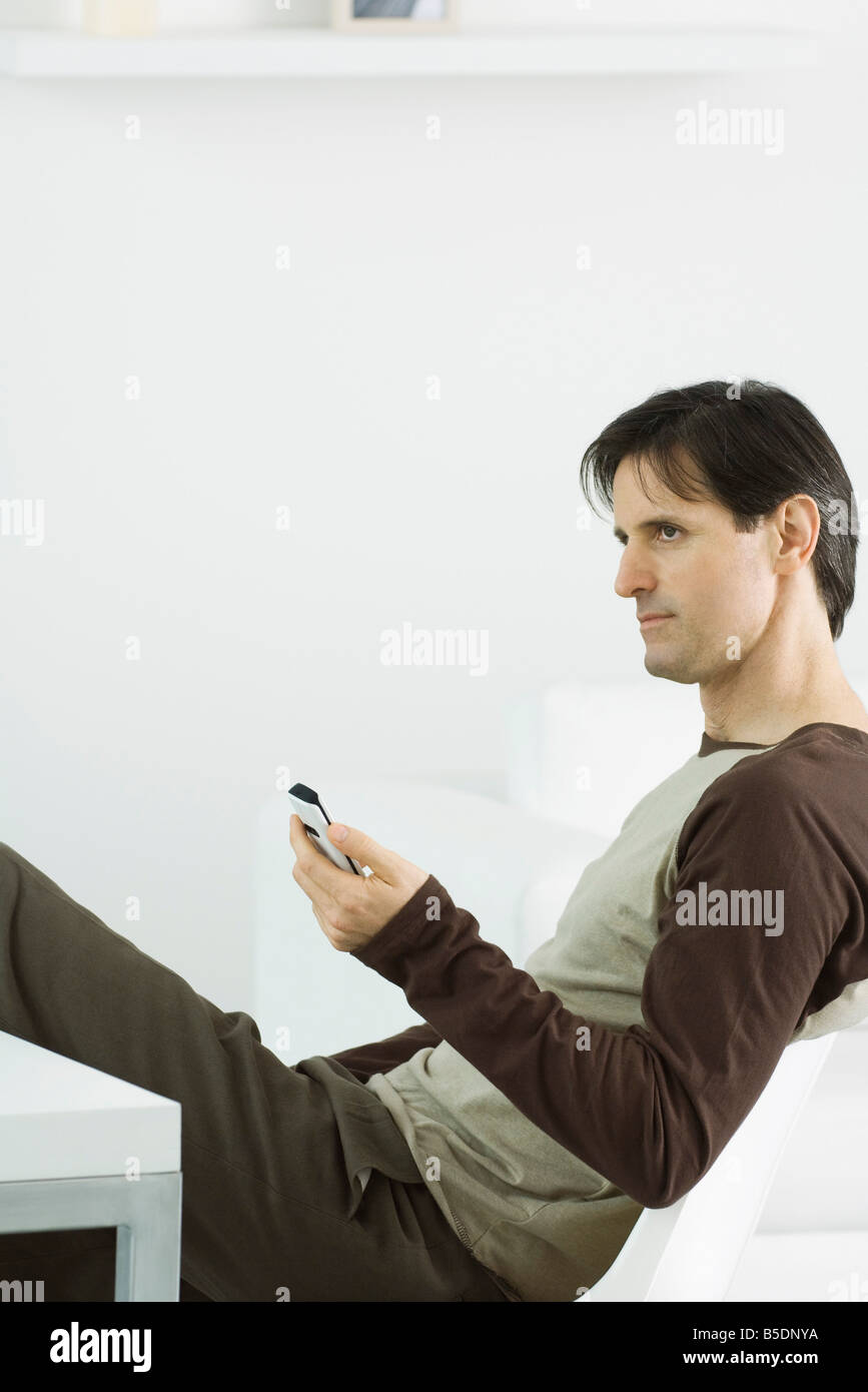 Phone controls tv hi-res stock photography and images - Alamy