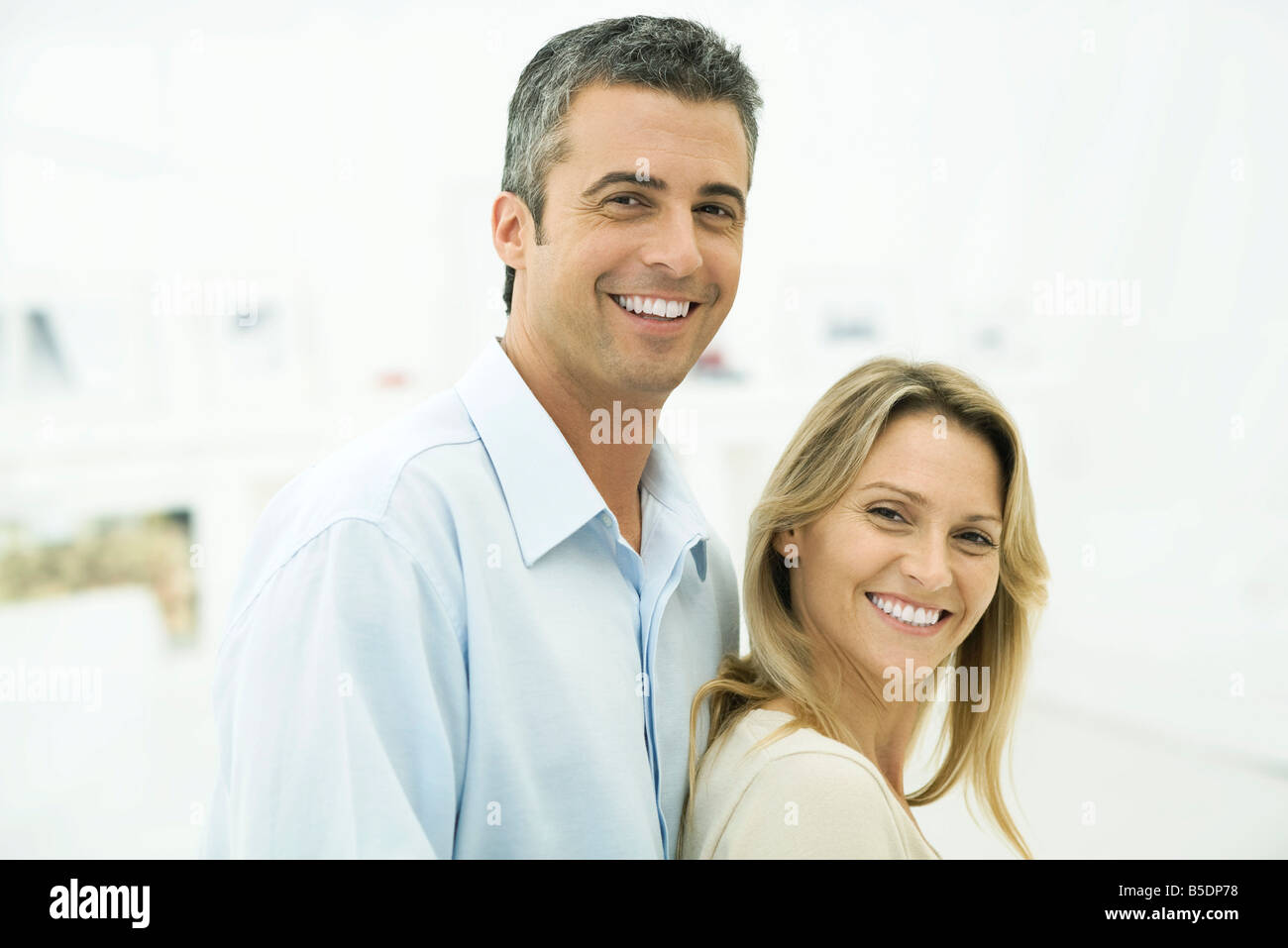 Man woman smiling at camera cut out hi-res stock photography and images ...