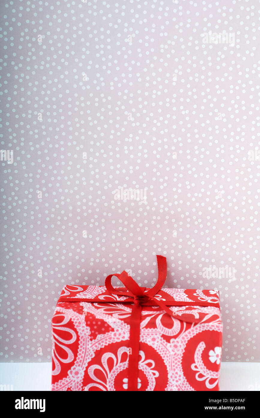 Brightly colored wrapped gift hi-res stock photography and images - Alamy