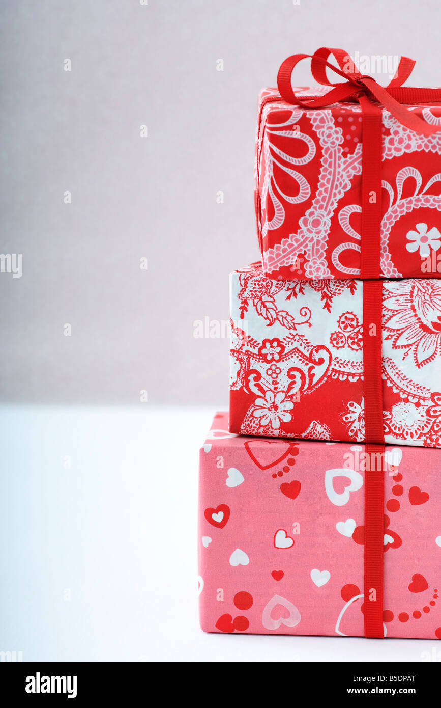 Stack of three gift-wrapped presents Stock Photo - Alamy