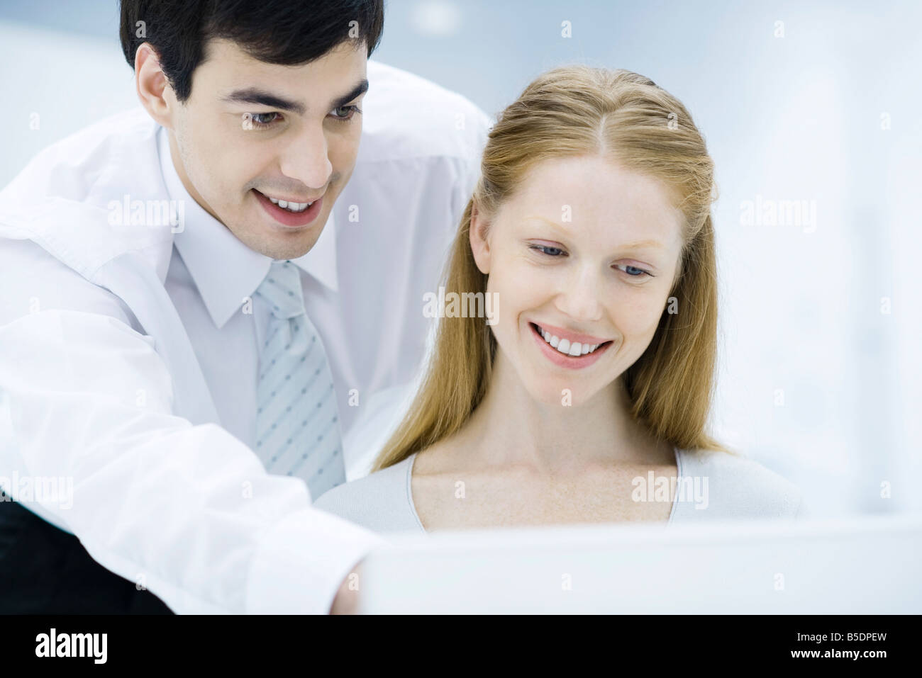 Supervisors looking at computer hi-res stock photography and images - Alamy