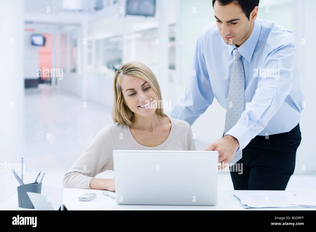 Two professionals focus on laptops hi-res stock photography and images ...