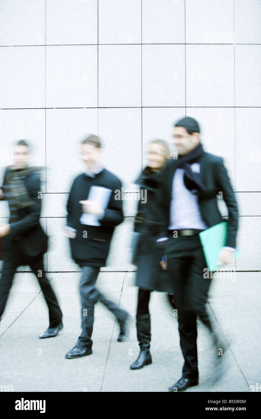 Business associates walking together down sidewalk Stock Photo - Alamy Business associates walking together down sidewalk Stock Photo - Alamy
