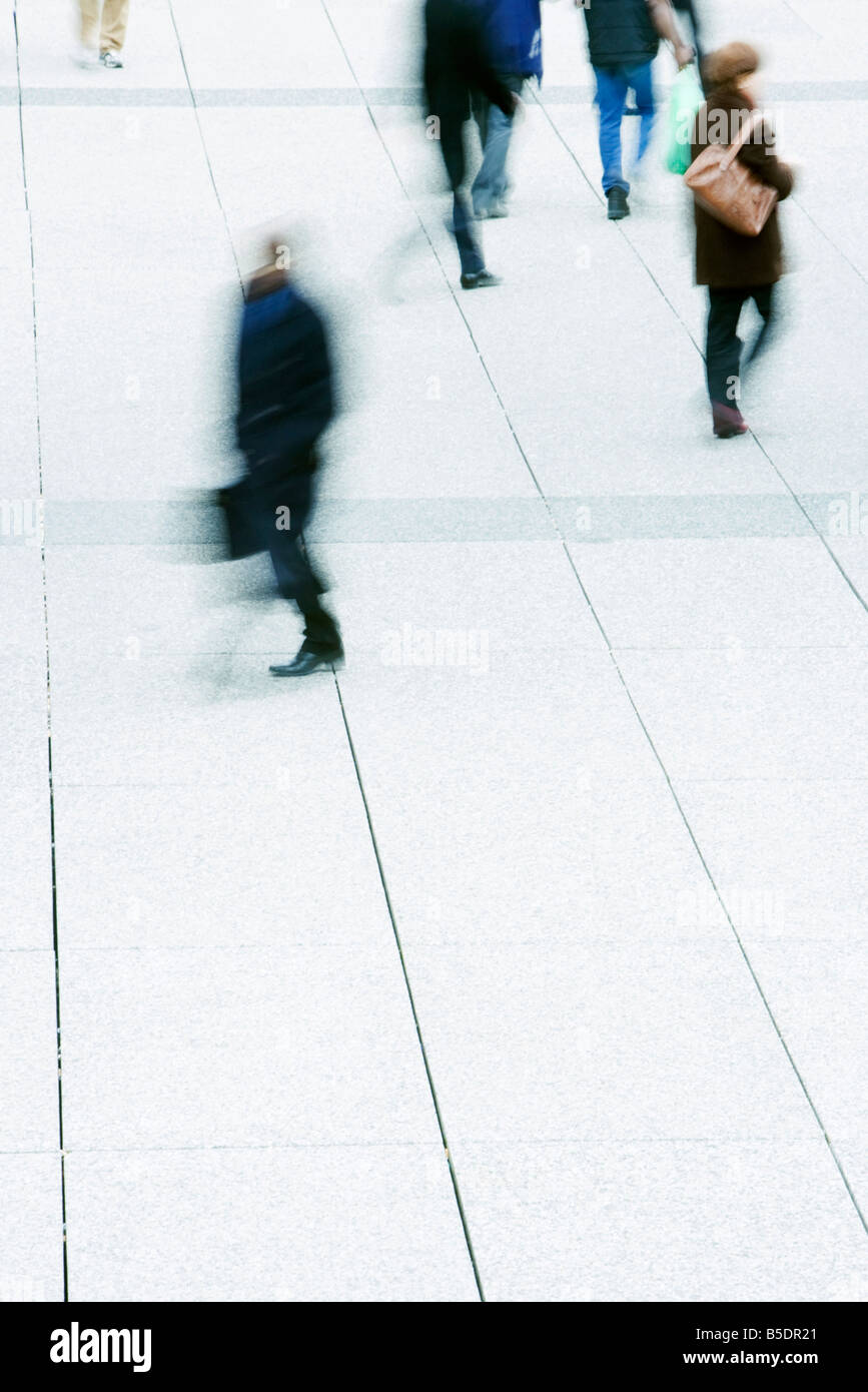 Pedestrians crossing public square Stock Photo - Alamy