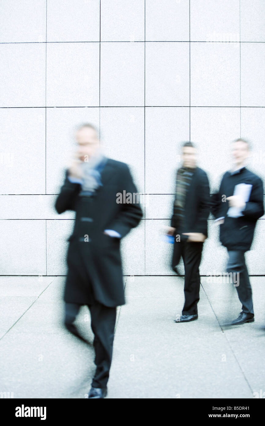 Pedestrians on sidewalk Stock Photo - Alamy