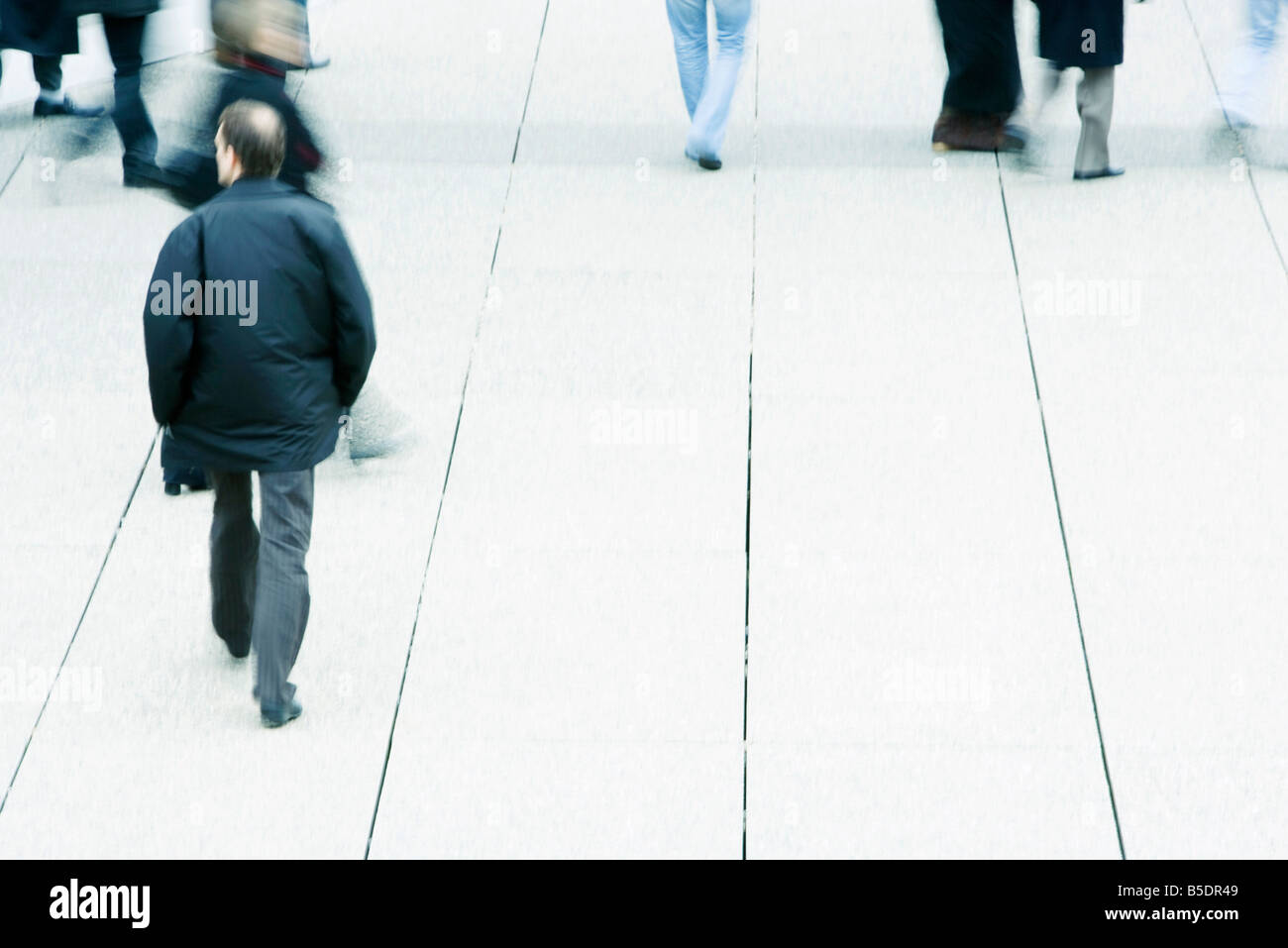 Pedestrians on sidewalk Stock Photo - Alamy