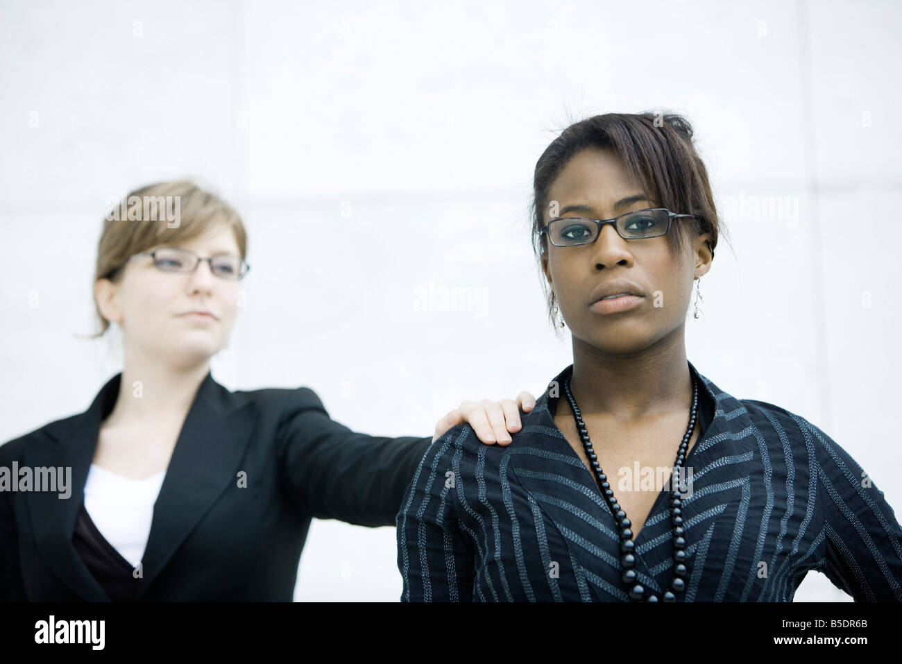 Tapping the shoulder hi-res stock photography and images - Alamy