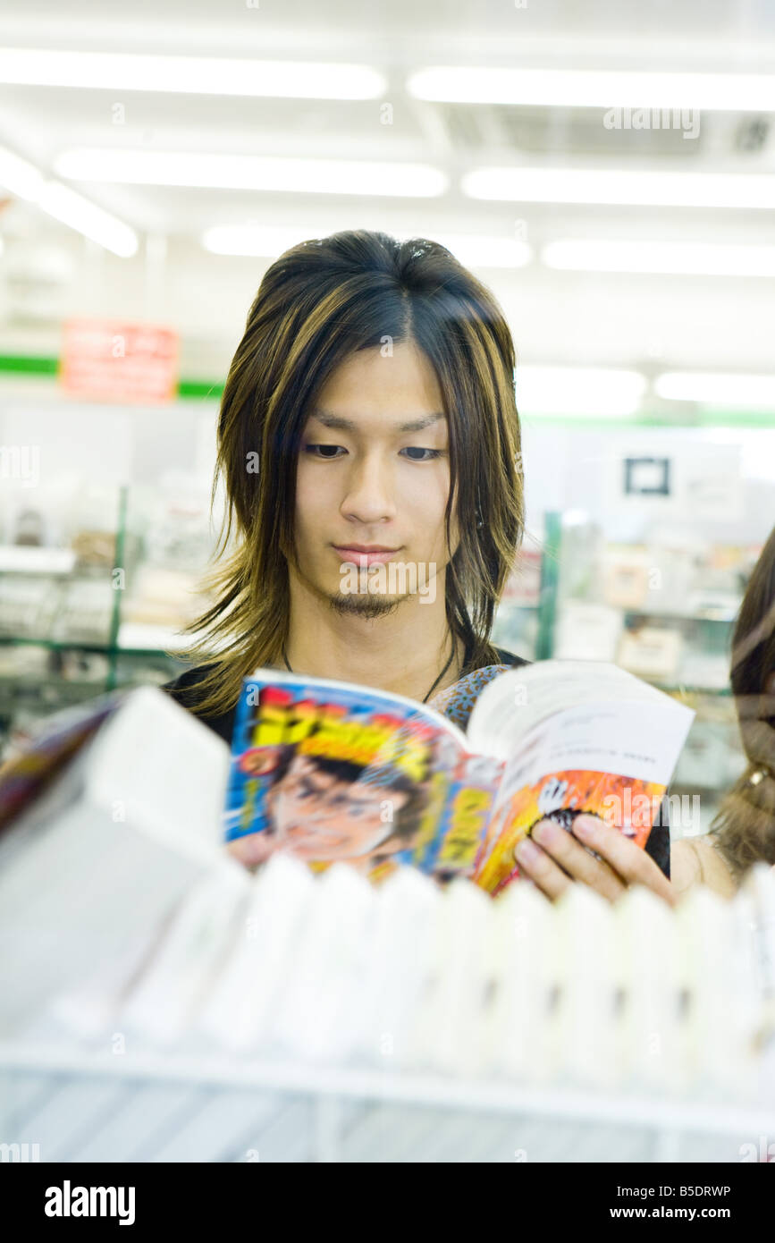 Adult reading comic hi-res stock photography and images - Alamy