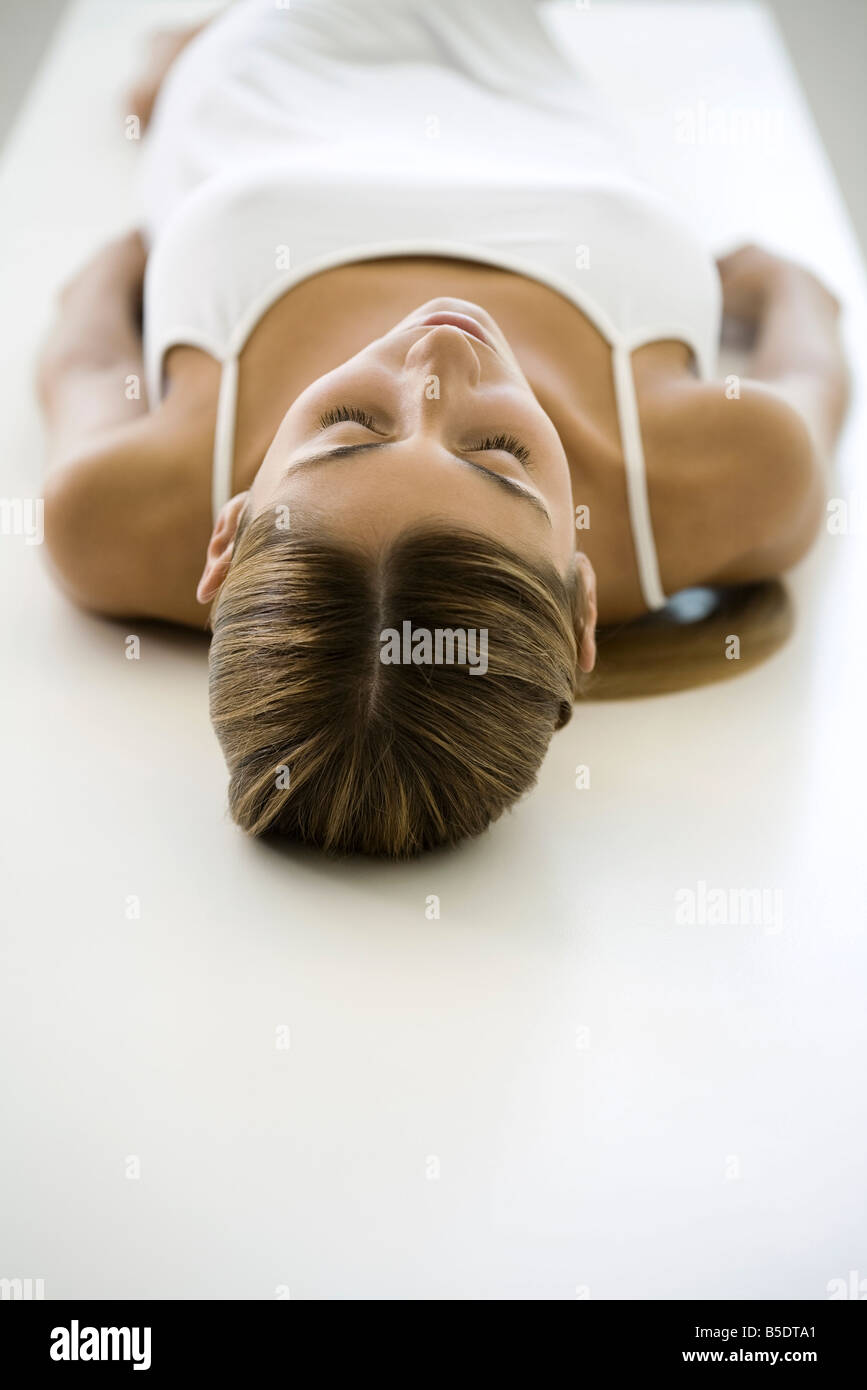 Woman Lying Down On Back