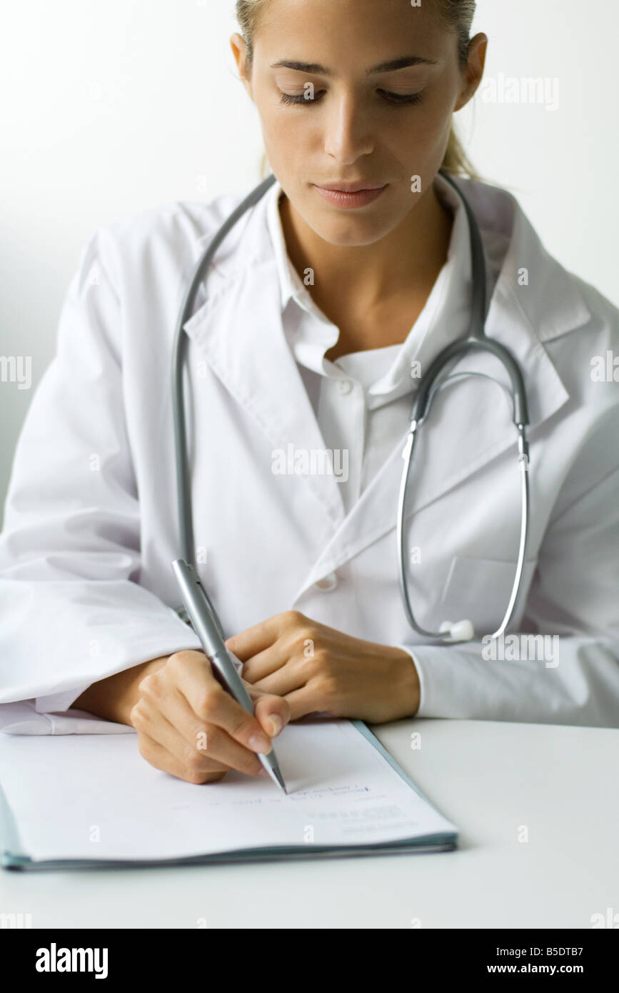Cropped view doctor writing hi-res stock photography and images - Alamy