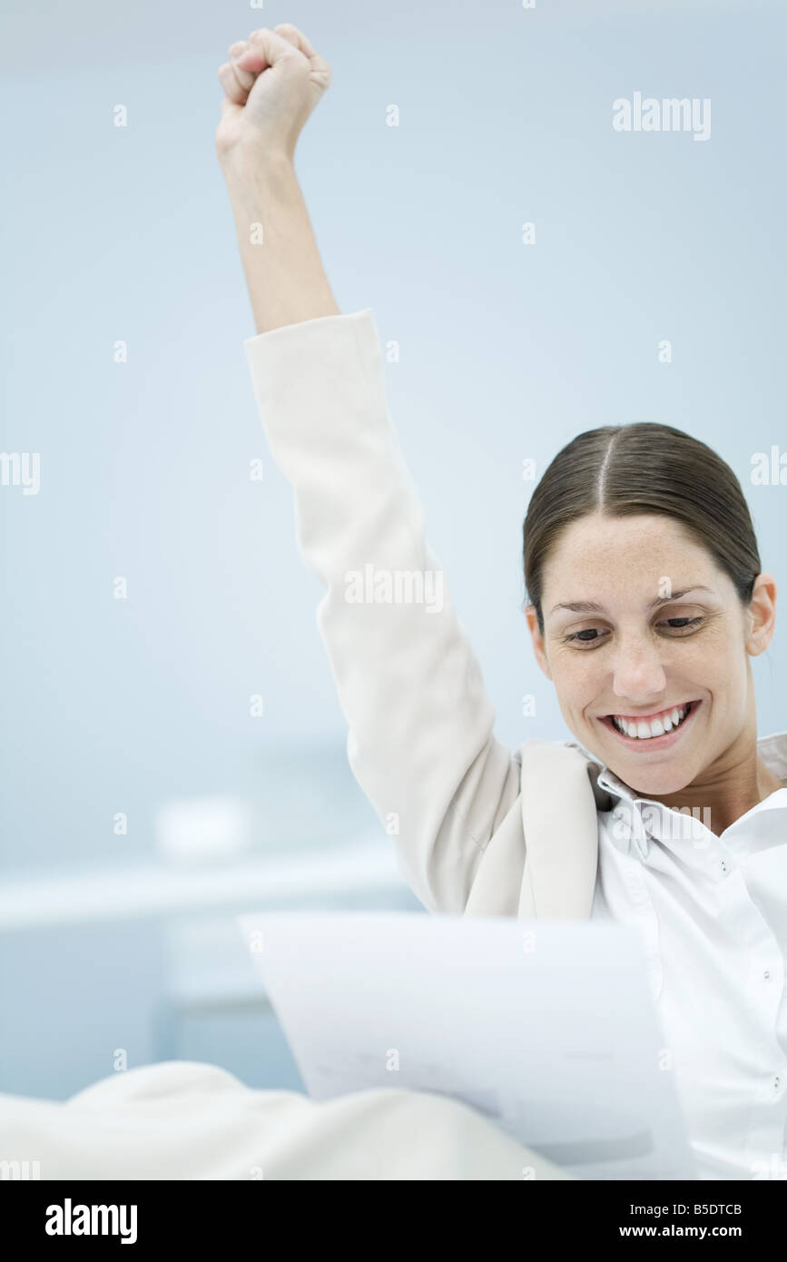 Back view woman raised fist hi-res stock photography and images - Alamy