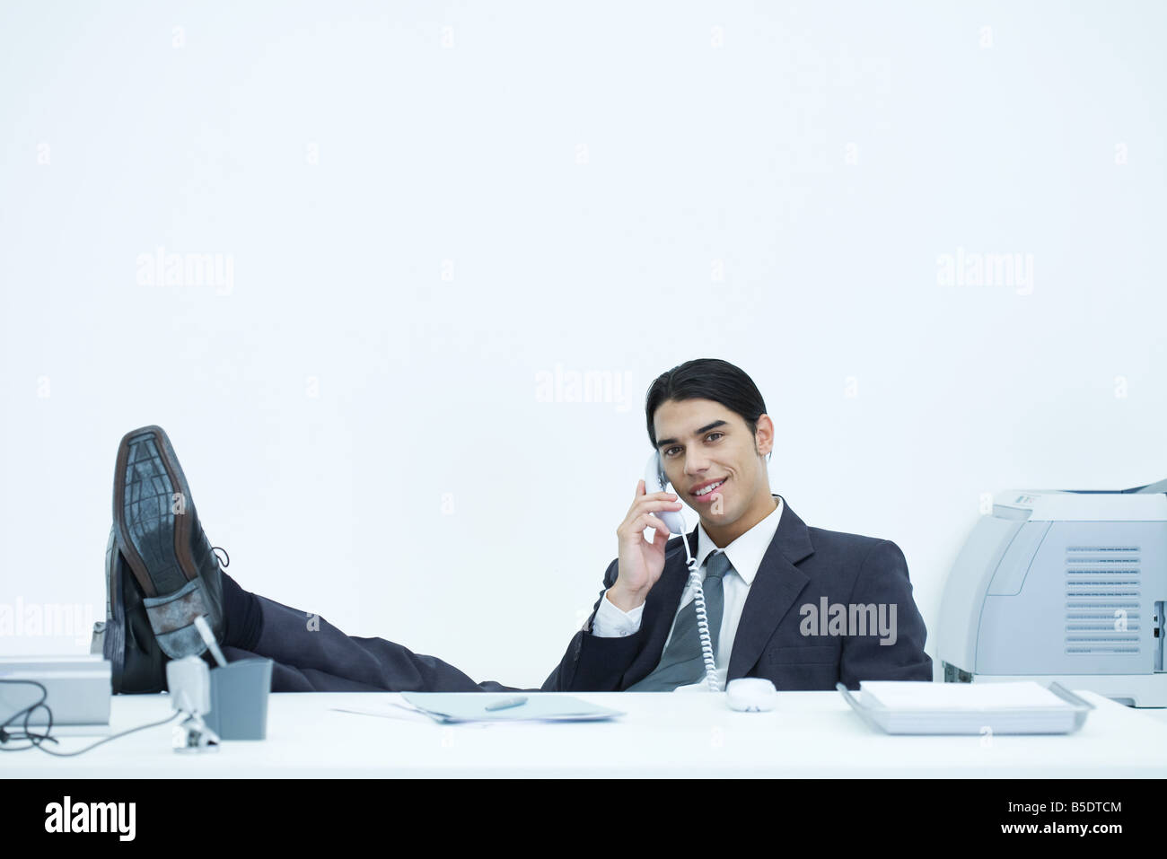 Business man feet on desk cut out hi-res stock photography and images ...