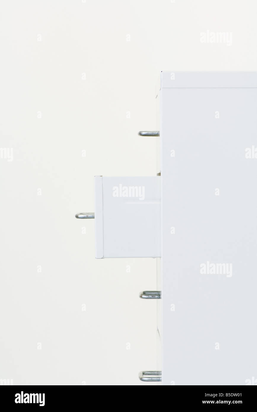 Filing cabinet with one drawer open, side view Stock Photo - Alamy