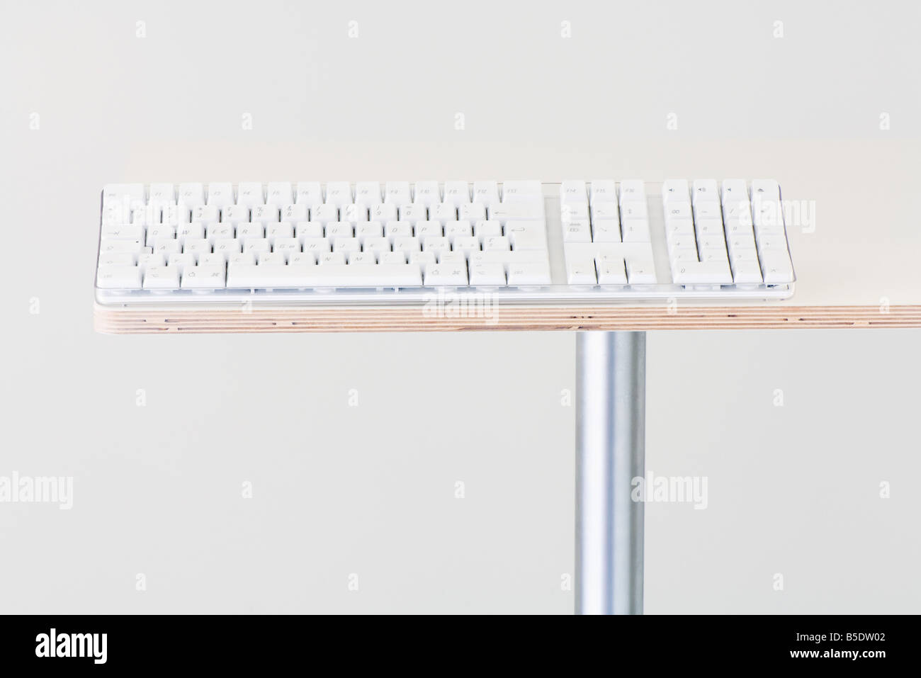 Computer keyboard on table Stock Photo - Alamy