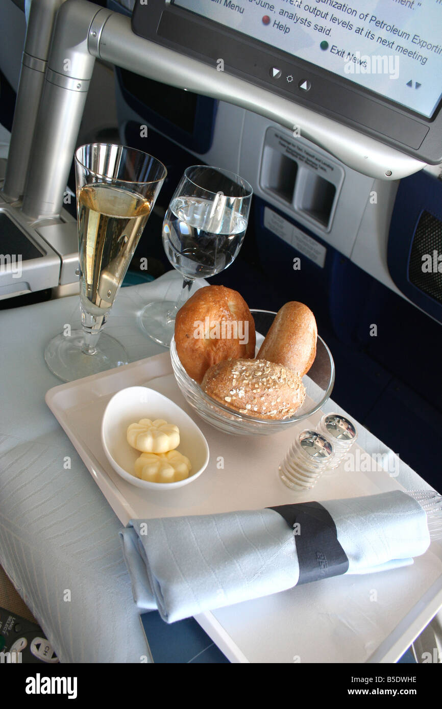 First class cabin dining food Jet Airways plane Stock Photo - Alamy