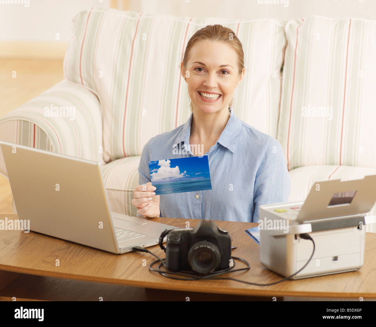 Woman Printing Out Digital Photographs Stock Photo - Alamy