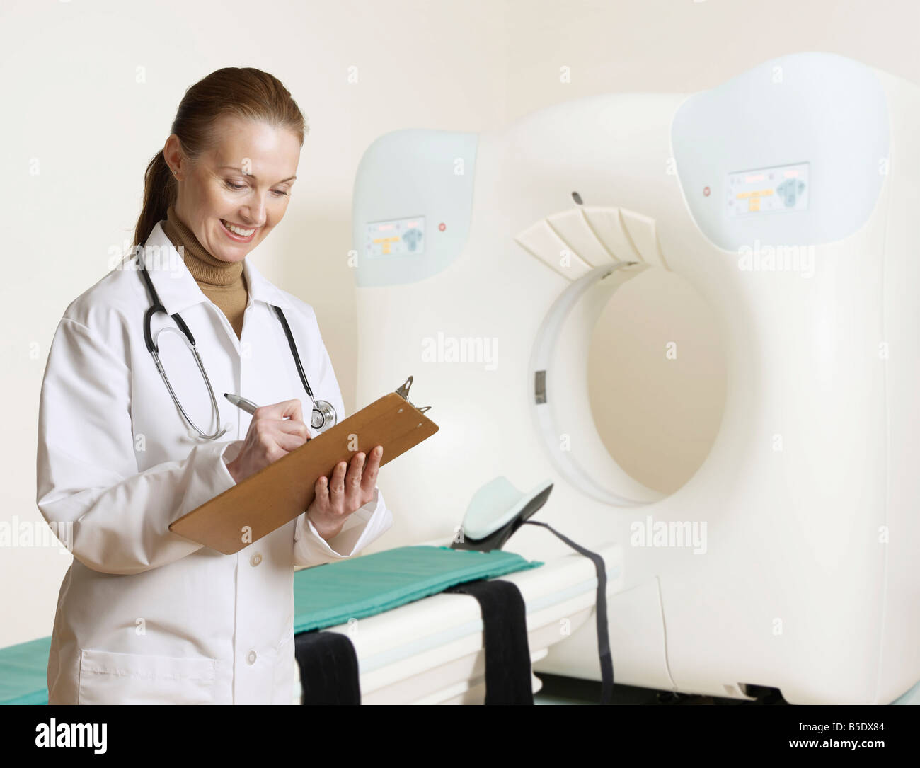 Female Doctor near MRI Scanner Stock Photo - Alamy