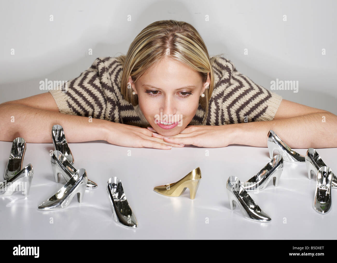 Woman and gold shoes hi-res stock photography and images - Alamy