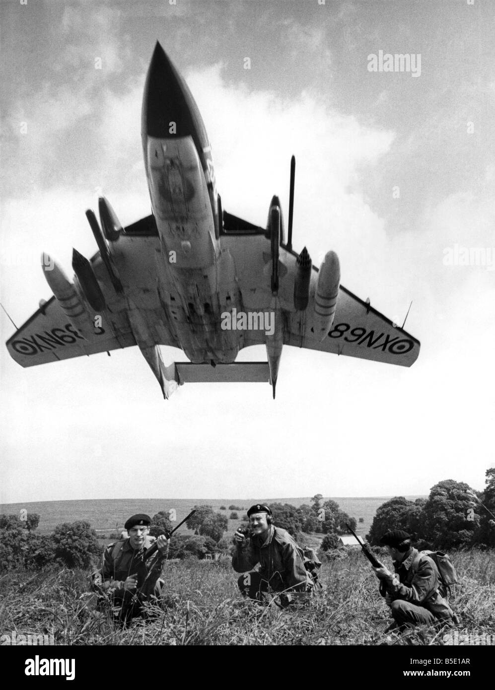 A Sea Vixen swoops over soldiers seen here on exercise on Salisbury ...