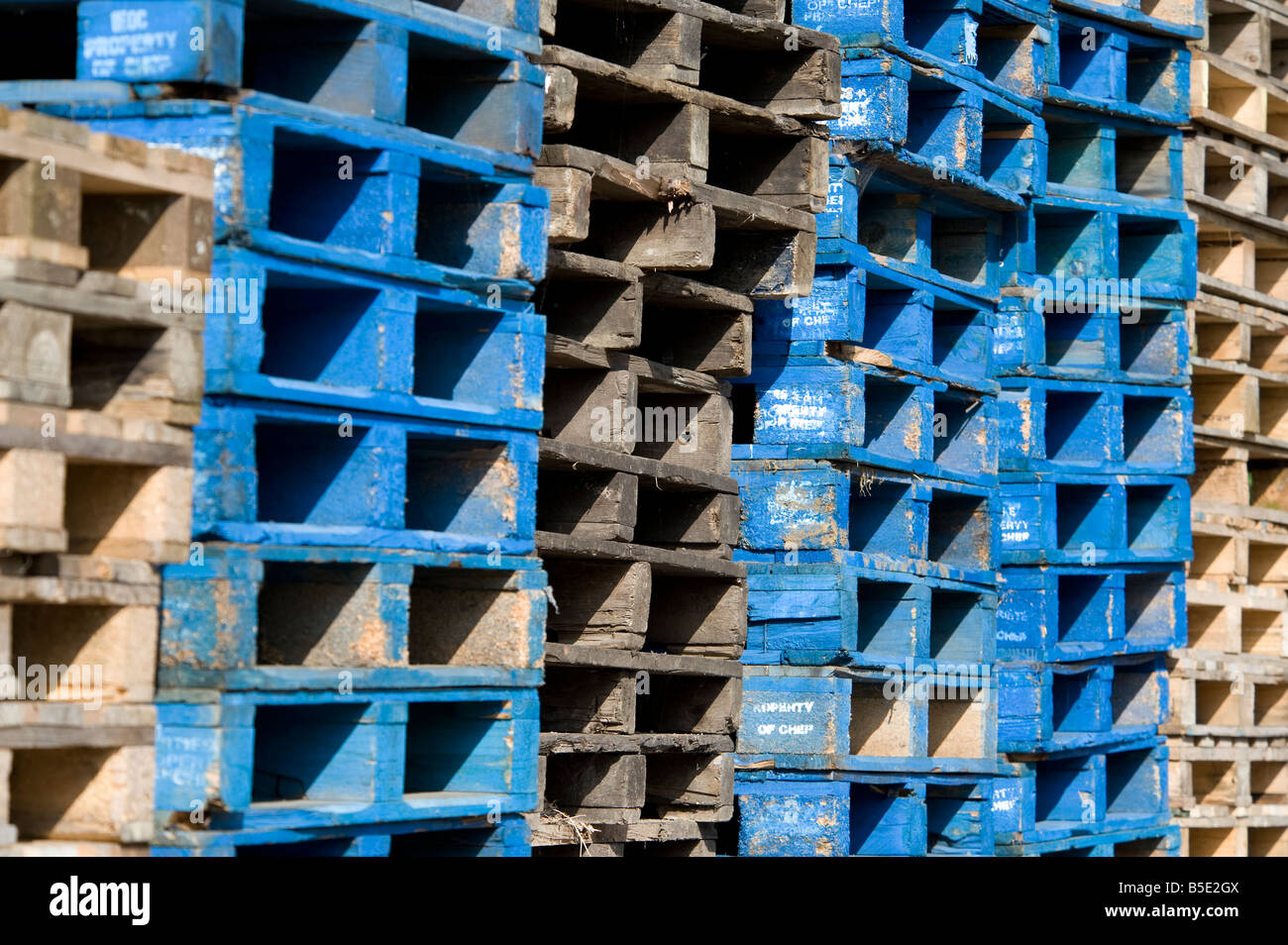 Stack of blue wooden pallets hi-res stock photography and images - Alamy