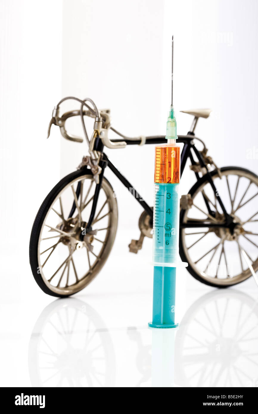 Racing cycle and syringe, close-up Stock Photo - Alamy