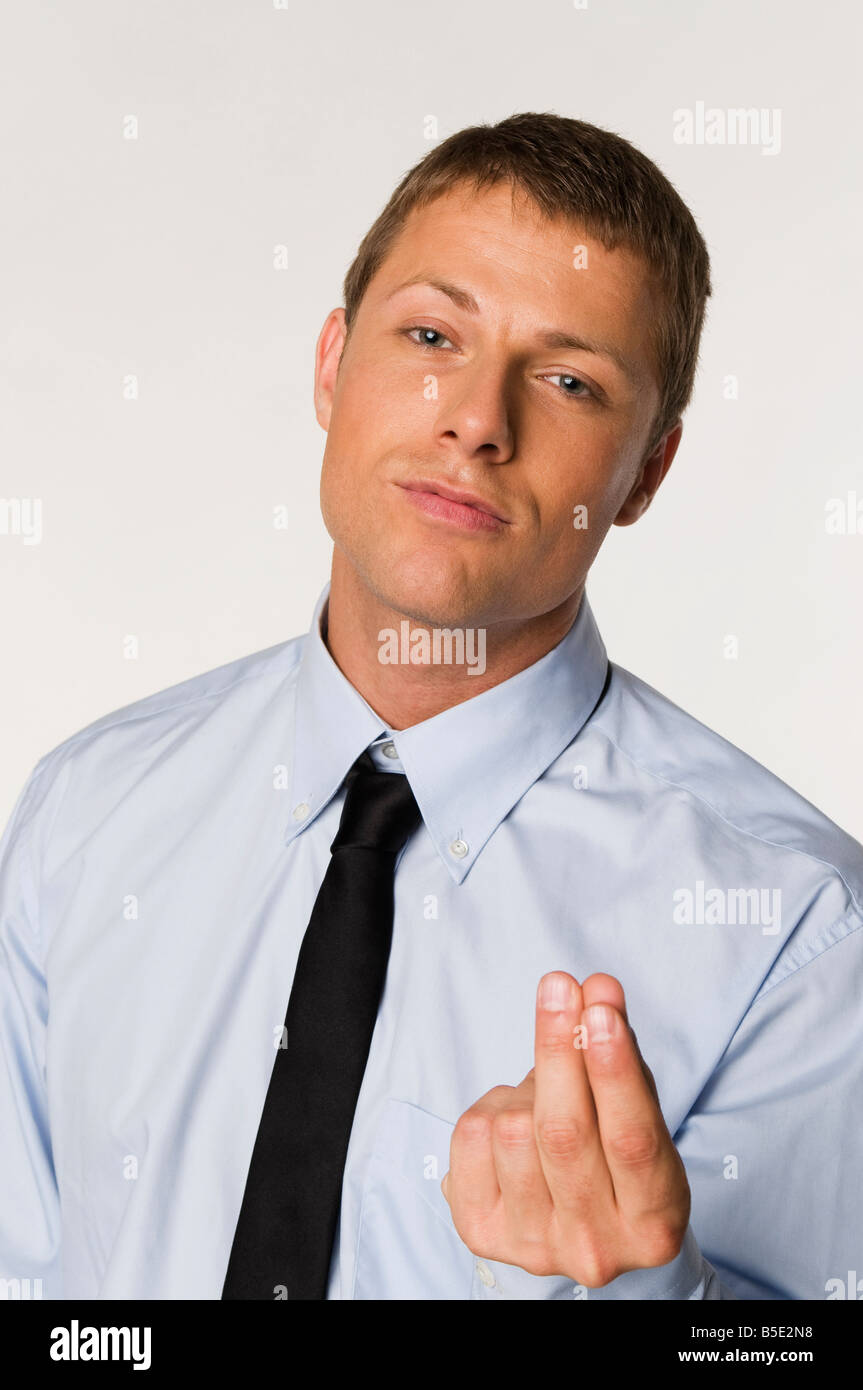 Businessman gesturing, portrait Stock Photo - Alamy