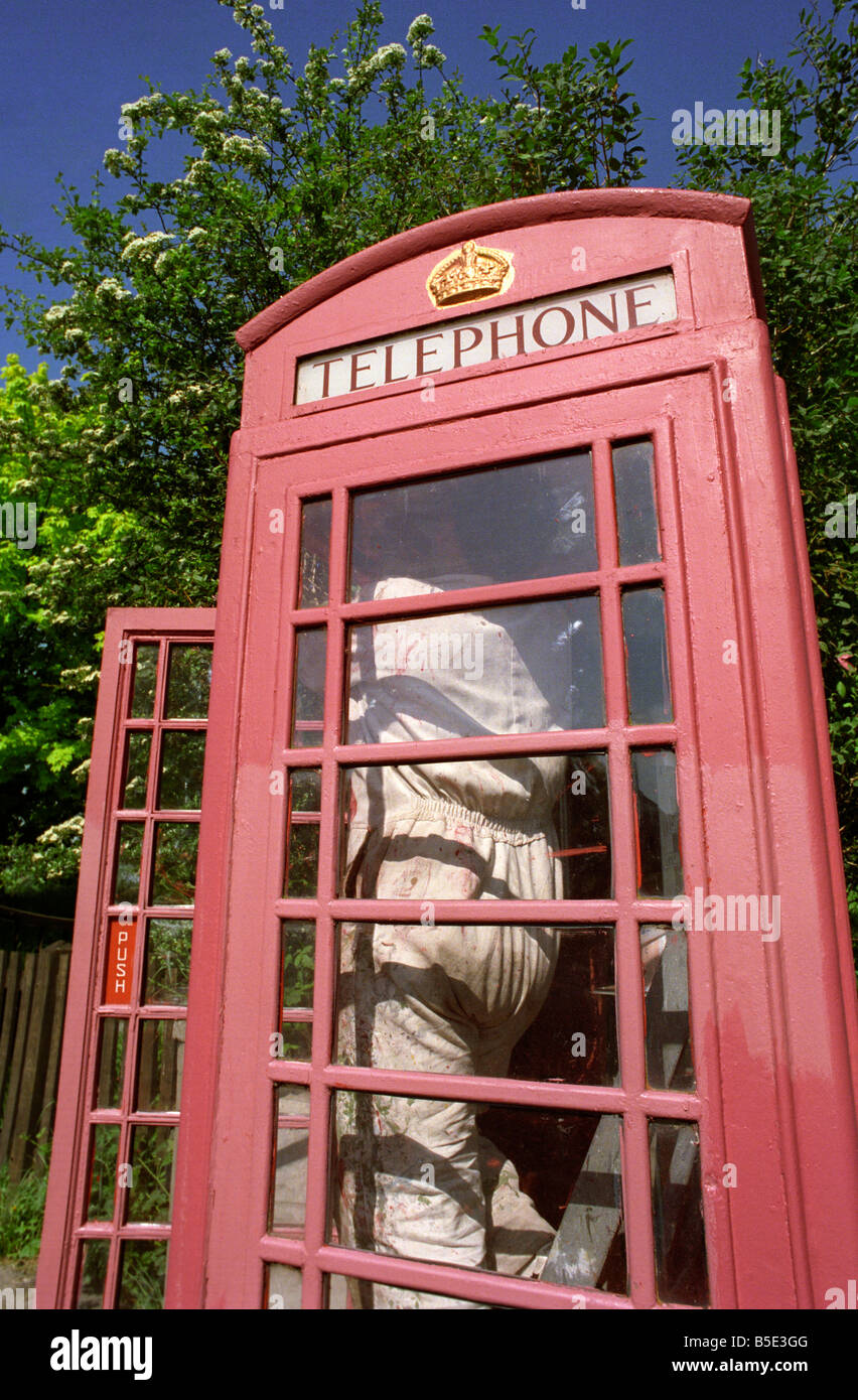 Man inside telephone box hi-res stock photography and images - Alamy