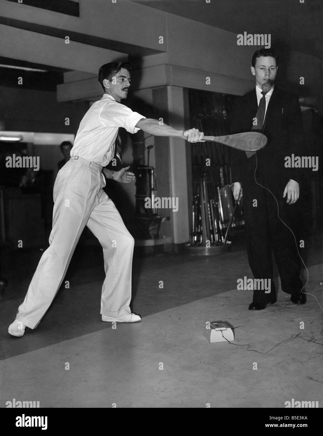 A Man Taking Part In The Basque Paddle And Ball Game Of Jokari At An Exhibition September 1952