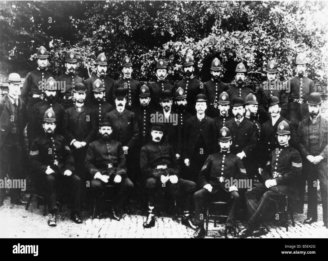 A group of police officers pose for the camera Stock Photo - Alamy