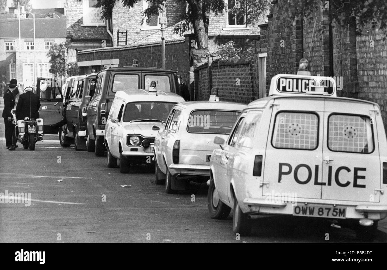A line of police cars and vans in a Newcastle Street Stock Photo - Alamy