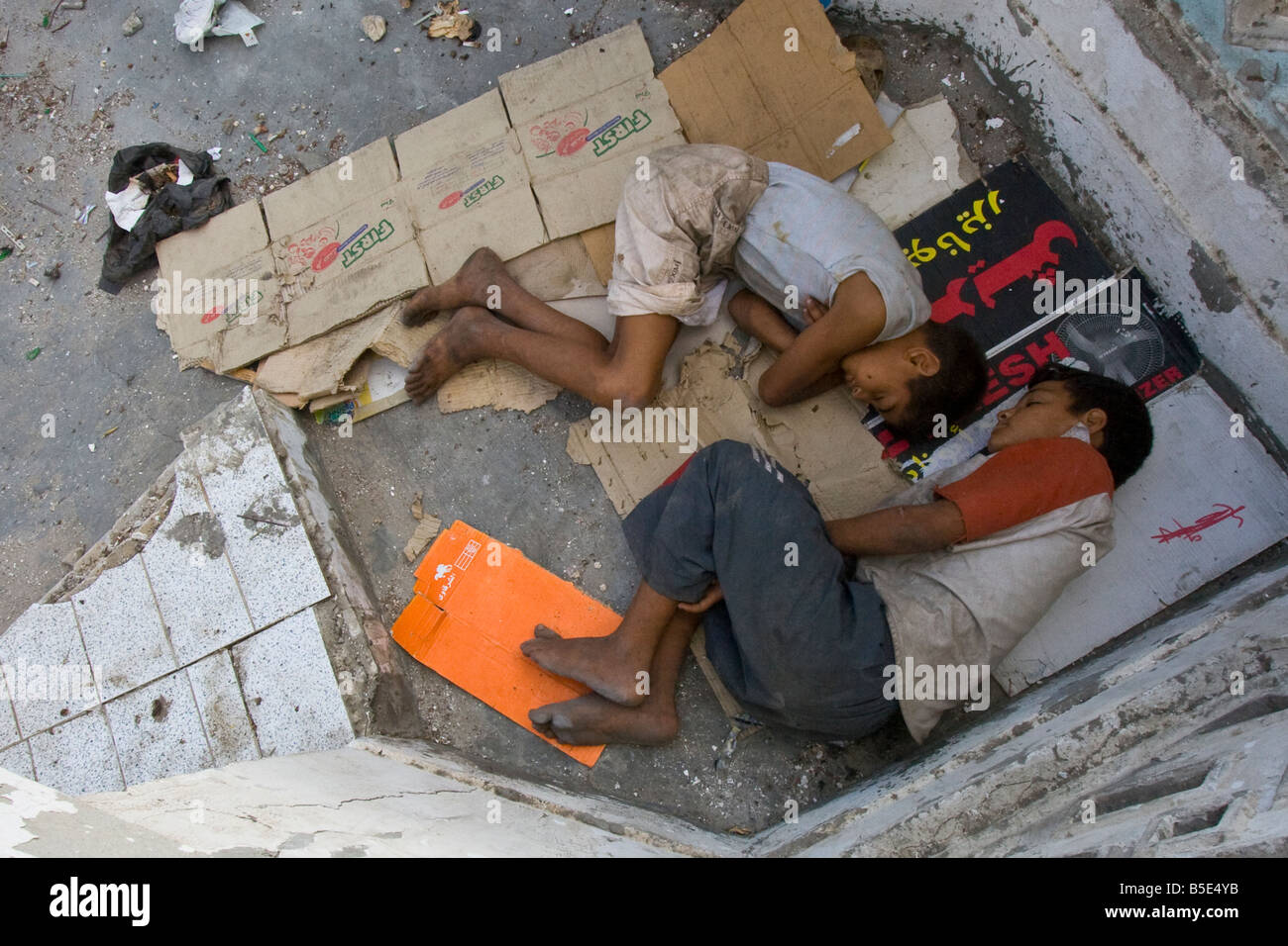 Homeless Boys Sleeping Outside in Alexandria Egypt Stock Photo - Alamy