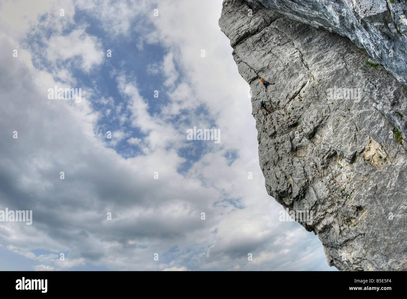 Germany, Bavaria, Chiemgau, Gederer Wand, Man free climbing Stock Photo ...